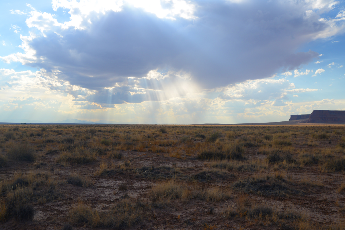 Large Cloud Creates A Panorama Of Sunbeams Over The Remote Plains Of ...